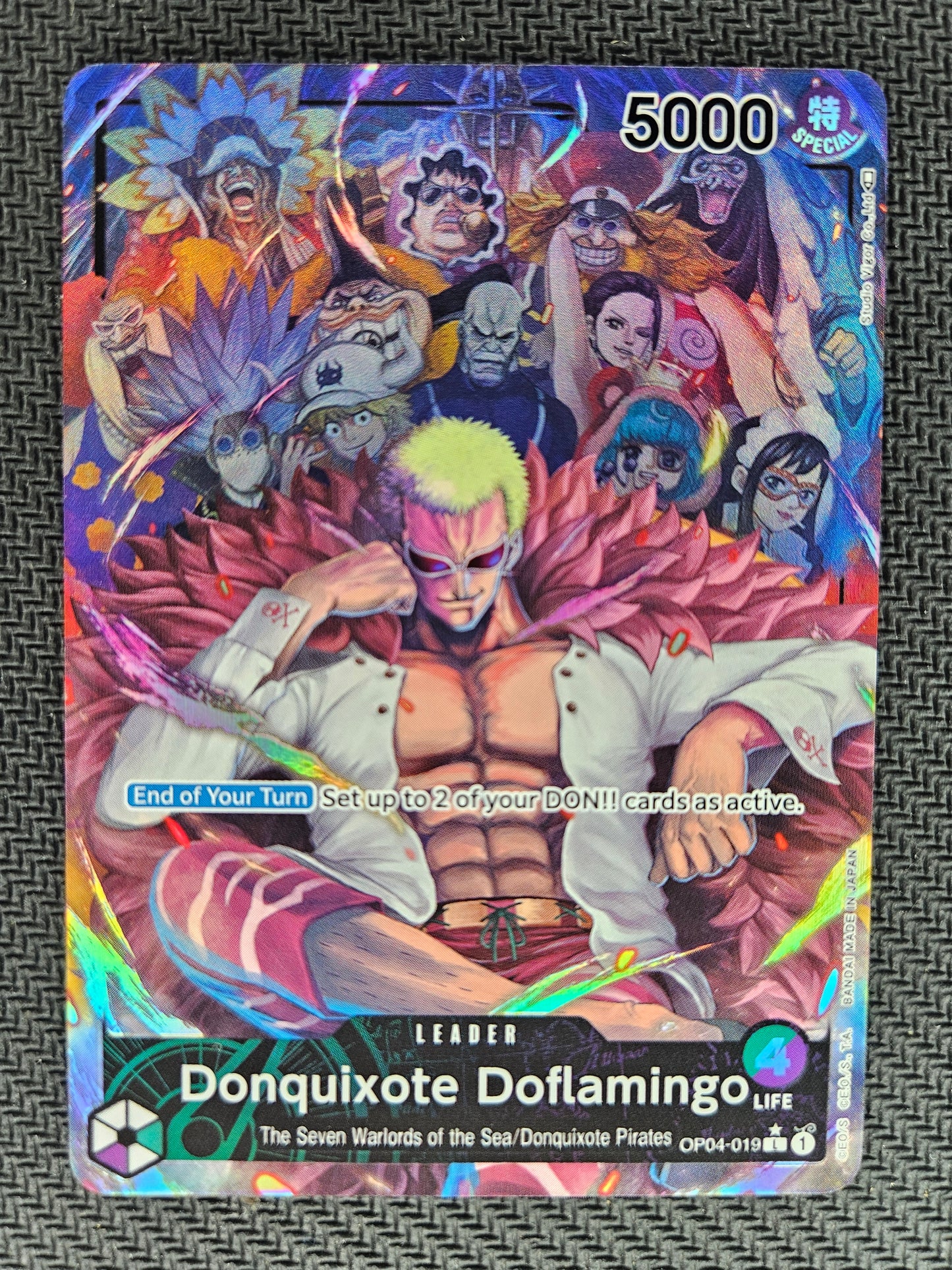 One Piece TCG Kingdoms of Intrigue OP04-019 Donquixote Doflamingo Lead – Mint Collectables