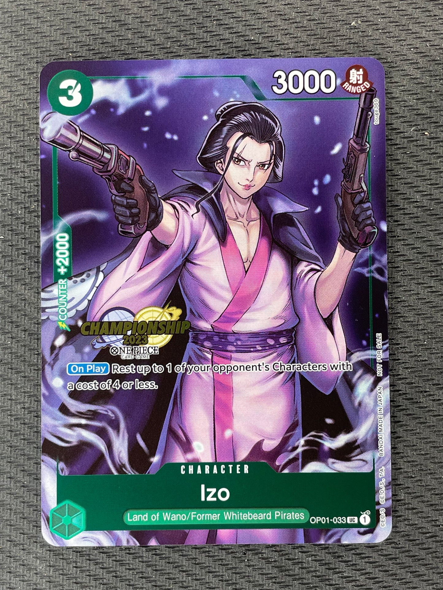 One Piece TCG OP01-033 Izo Championship Celebration 2023’ Stamped – Mint Collectables