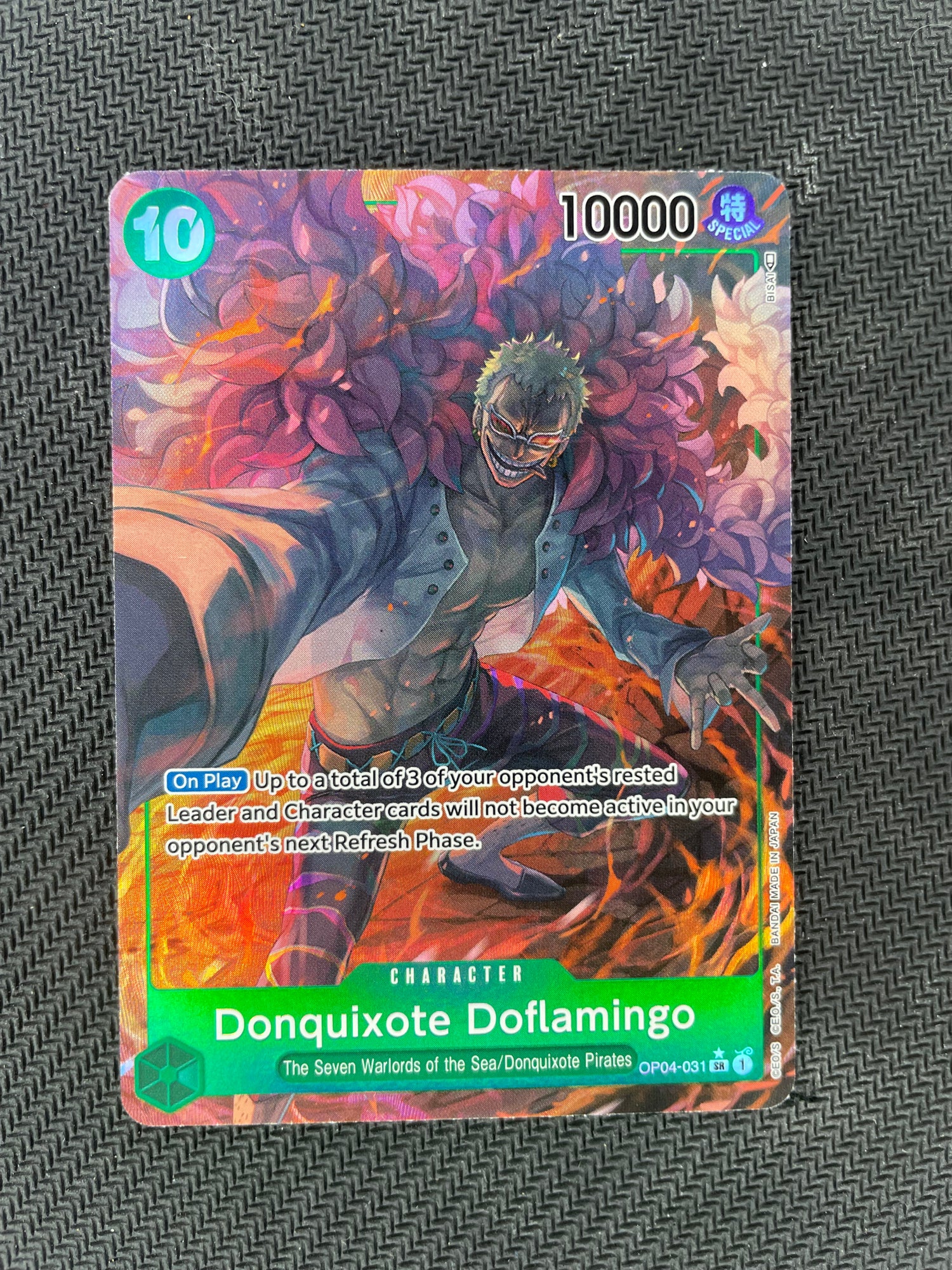 One Piece TCG Kingdoms of Intrigue OP04-031 Donquixote Doflamingo Alte – Mint Collectables